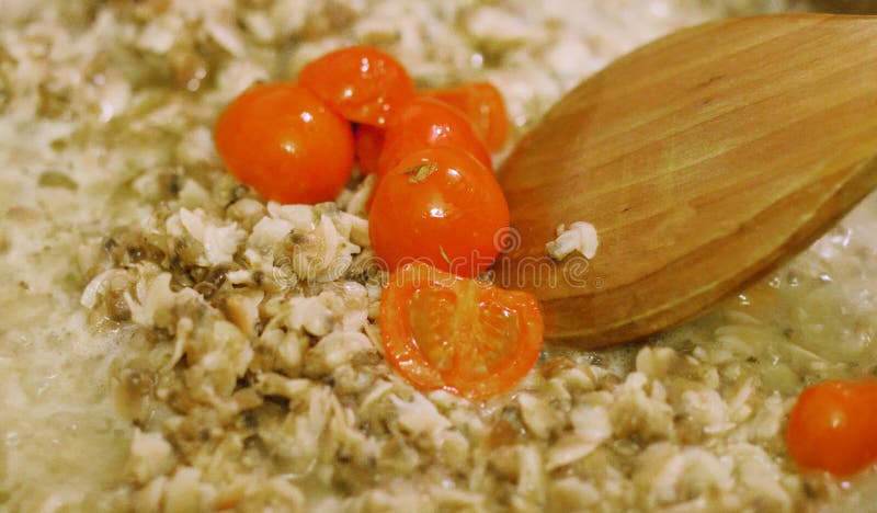 A Delicious Clams without Shell Coocking with Fresh Cherry Tomatoes ...