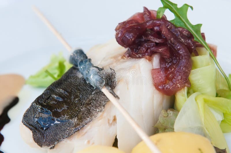 Delicious Cod Dish with Its Skin and Garnish Stock Photo - Image of ...