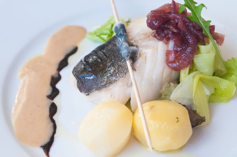 Delicious Cod Dish with Its Skin and Garnish Stock Image - Image of ...