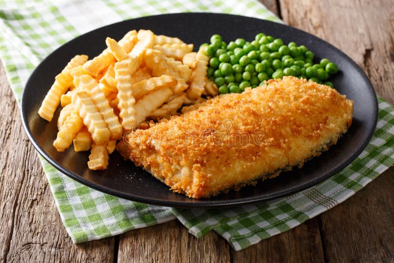 Delicious Cod Fish and Chips with Peas Close-up on a Plate. Horizontal ...