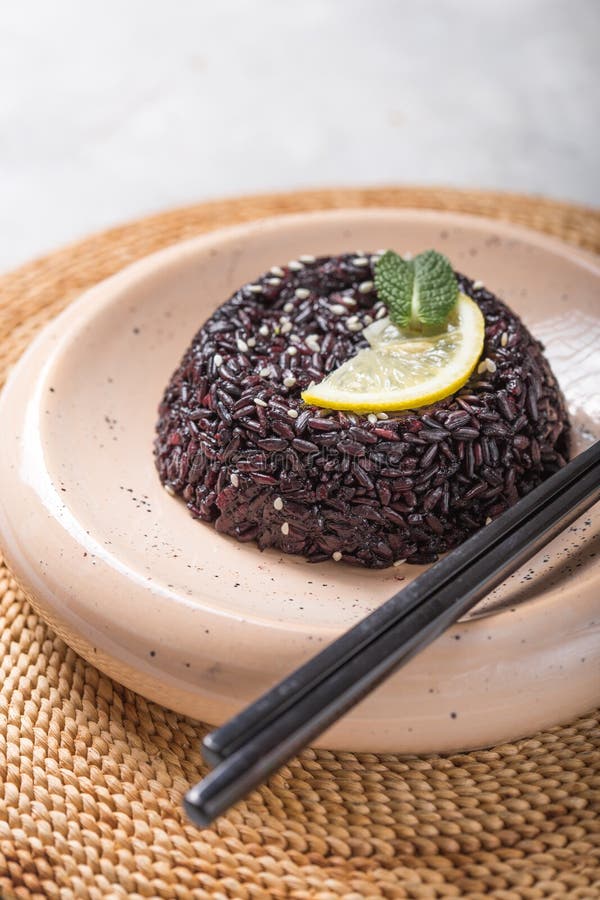 Delicious Cooked Black Rice or Risotto with Chopsticks Stock Image ...