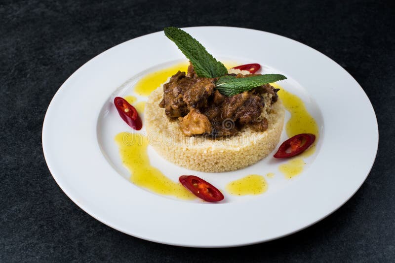 Delicious Cooked Couscous with Meat on a White Plate Stock Image ...