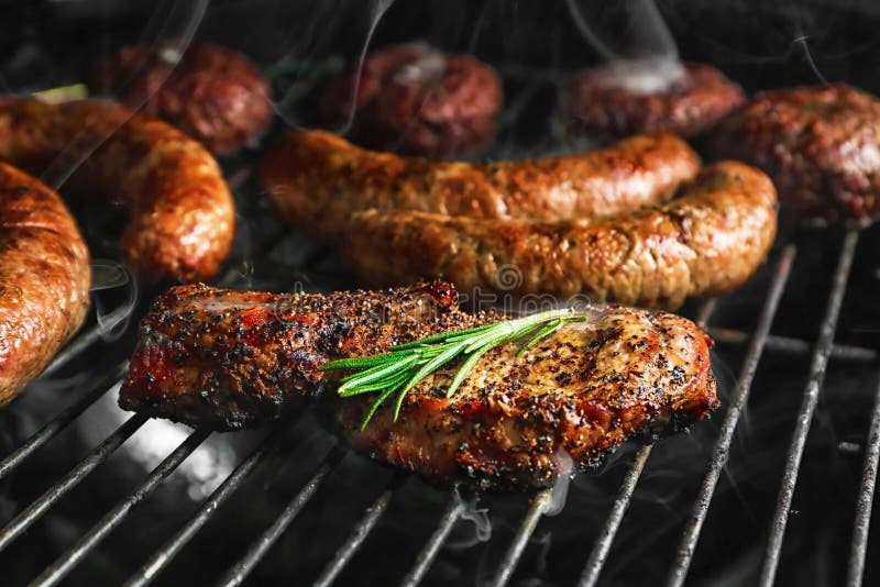 Delicious Cooked Meat on Barbecue Grill, Closeup Stock Image - Image of ...