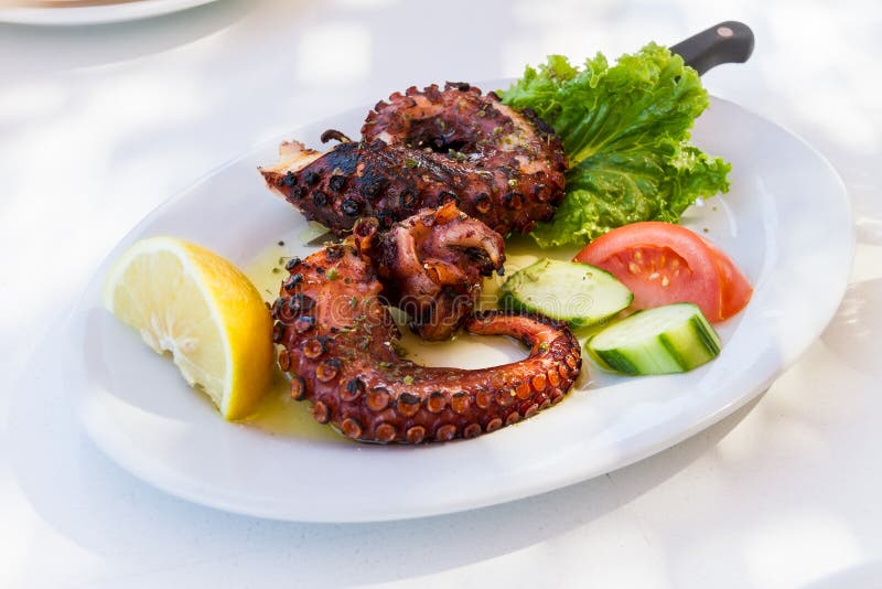 Delicious Cooked Octopus, Served on a Plate Stock Photo - Image of ...