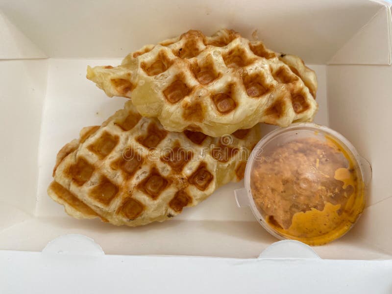 Delicious Craffles or Waffles with Cheese in a White Case. Isolated ...