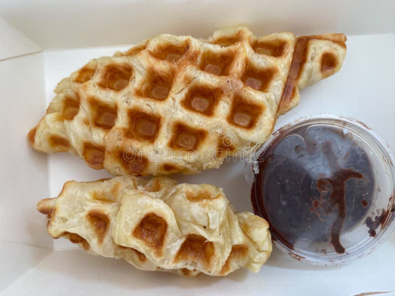 Delicious Craffles or Waffles with Chocolate Sauce in a White Case ...