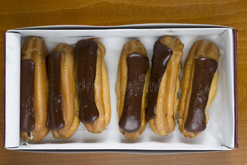 Delicious Custard Cakes with Chocolate in a Box Stock Photo - Image of ...