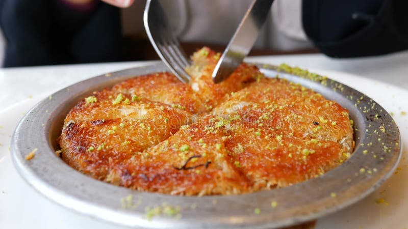 Delicious Dessert Kunefe Served in a Restaurant in the Evening Stock ...