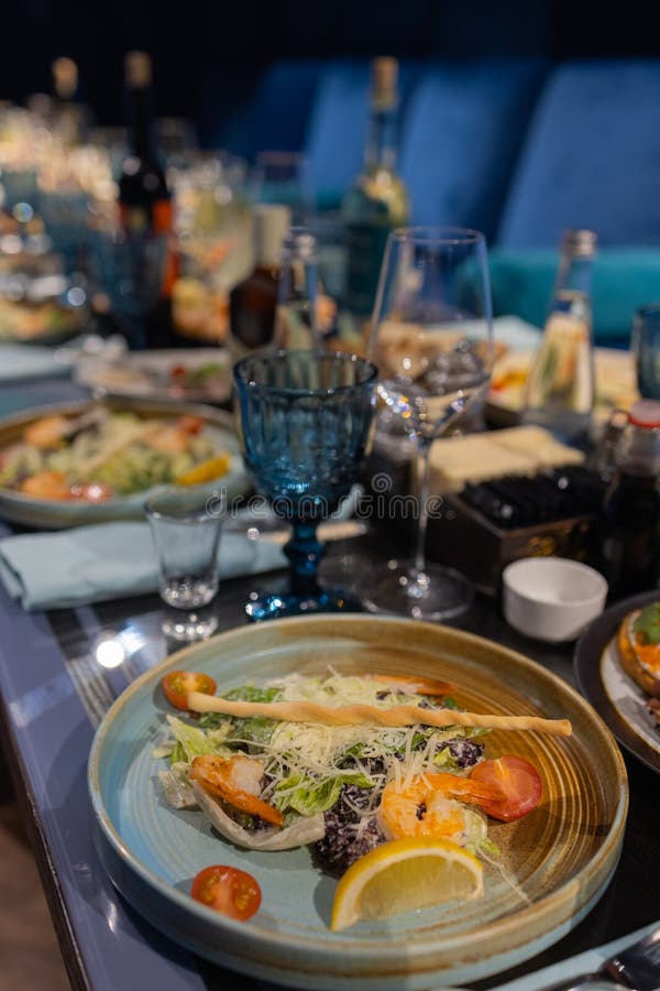 Delicious Dishes on the Table in the Restaurant. Serving Table ...