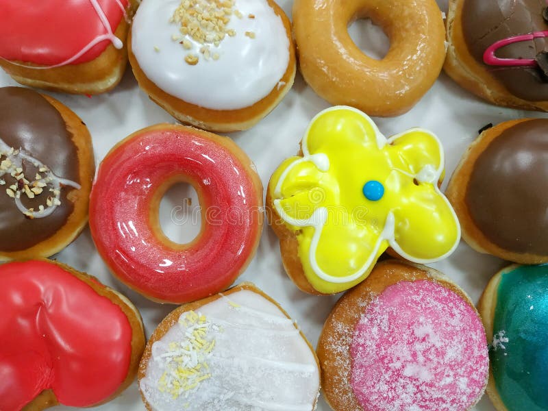 Delicious Donuts Covered with Multi-colored Glaze Stock Photo - Image ...