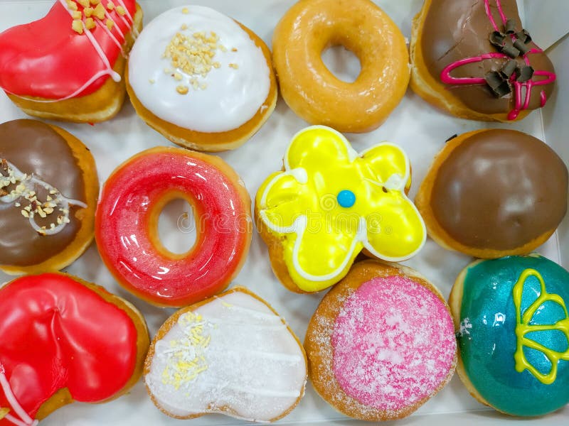 Delicious Donuts Covered with Multi-colored Glaze Stock Image - Image ...