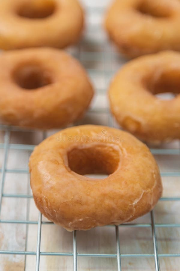 Delicious Donuts on Iron Griddle Covered with Cloth Stock Photo - Image ...