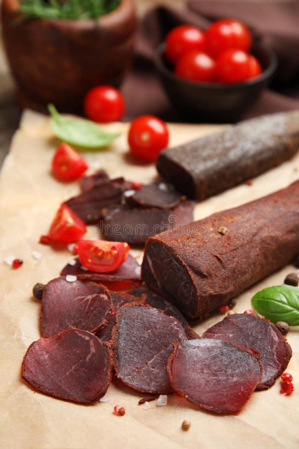 Delicious Dry-cured Beef Basturma with Basil, Tomatoes and Spices on ...