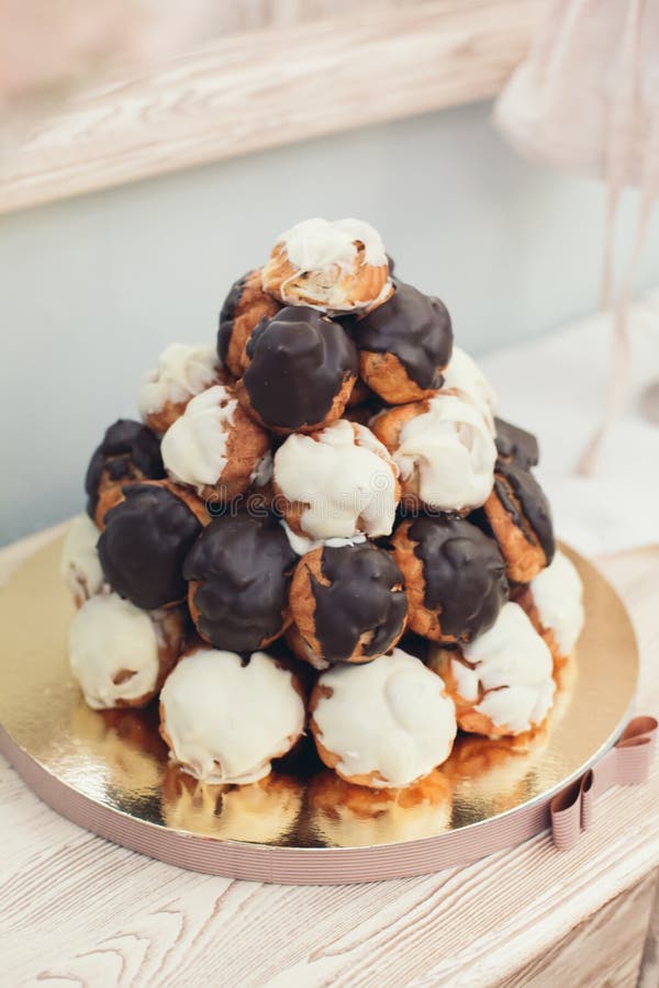 Delicious Eclair Cake Coated with White and Chocolate Icing Stock Photo ...