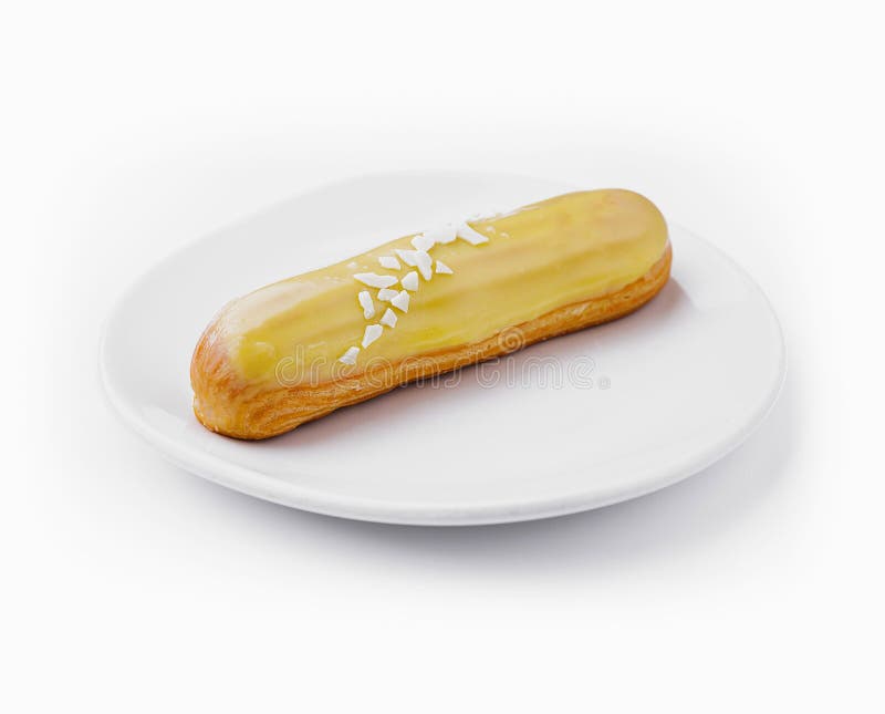 Delicious Eclair with Custard on Plate Stock Photo - Image of fresh ...