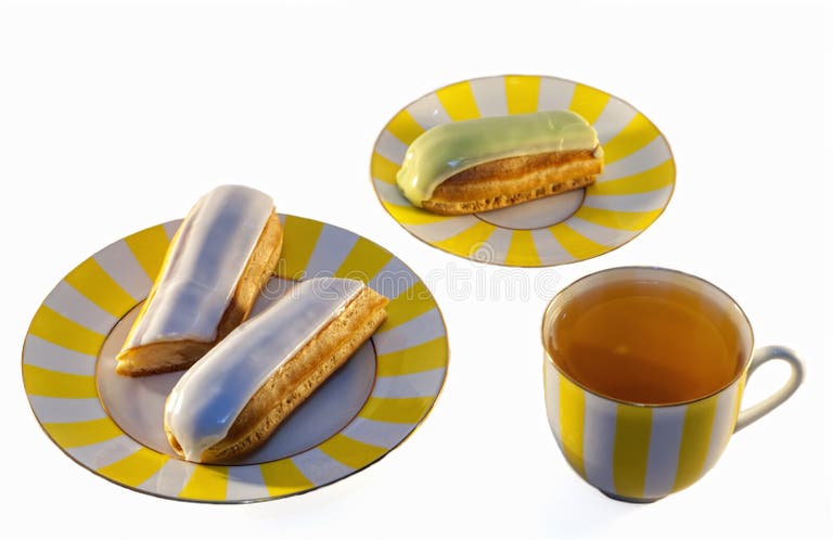 Delicious Eclairs and a Cup of Tea Stock Photo - Image of eclairs ...