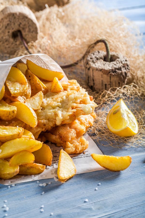 Delicious Fish Cod with Chips in Newspaper Stock Photo - Image of ...