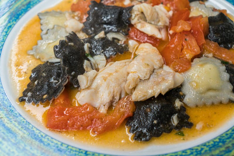 Delicious Fish Ravioli Pasta with Tomato Sauce Stock Image - Image of ...
