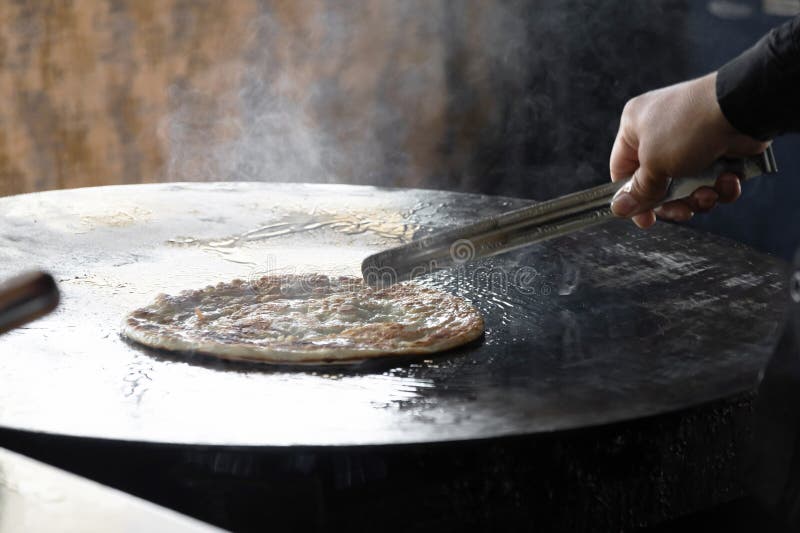 Delicious Flatbread Cooking on Hot Surface Stock Image - Image of dough ...