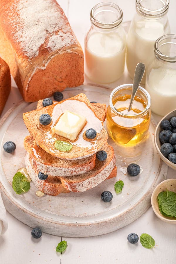 Delicious and Fresh Bread with Berries, Butter and Maple Syrup Stock ...