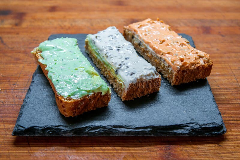 A Delicious Fresh Bread with Herb Cream for the Breakfast Stock Image ...