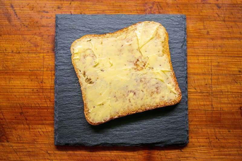 A Delicious Fresh Bread with Herb Cream for the Breakfast Stock Photo ...
