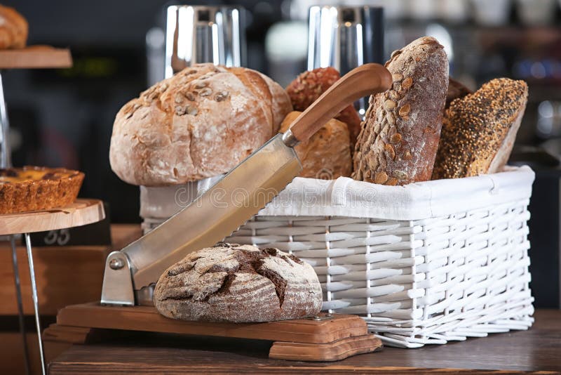 Delicious Fresh Bread on Table in Bakery Stock Image - Image of ...