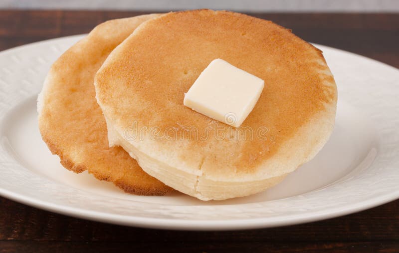 Delicious Fresh British Crumpets with Butter Stock Photo - Image of ...