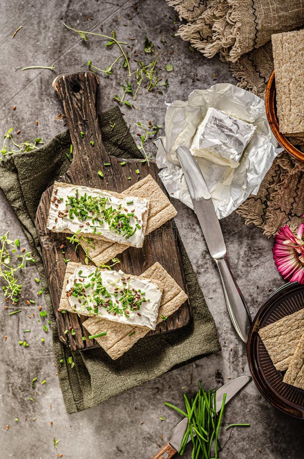 Delicious Fresh Cheese with Herbs on Crispbread Stock Photo - Image of ...
