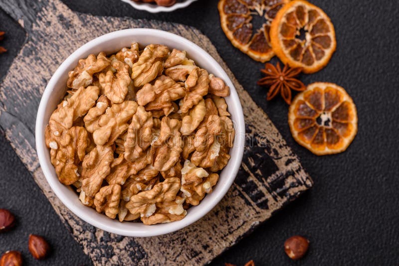 Delicious Fresh Peeled Raw Walnuts in a Ceramic Plate Stock Image ...
