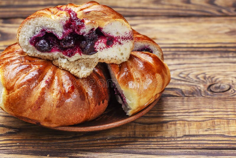 Delicious Fresh Sliced Bun Stuffed with Currant Berries, Close-up Stock ...