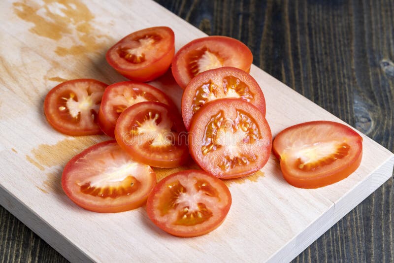 Delicious Fresh Tomato Cut into Chunks on the Table Stock Image - Image ...