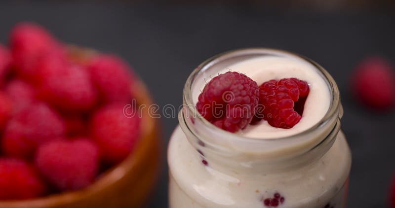 Raspberry Yogurt on the Table Close Up Stock Video - Video of view, freshness: 331269031