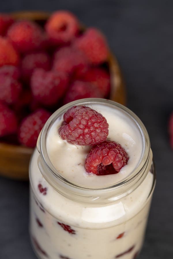 Delicious and Fresh Yogurt with Raspberry Flavor and Whole Red ...