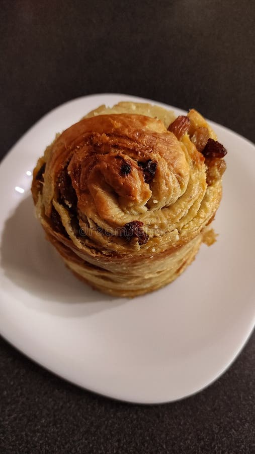 Golden Easter Bread Adorned with Raisins, Celebrating Festive ...