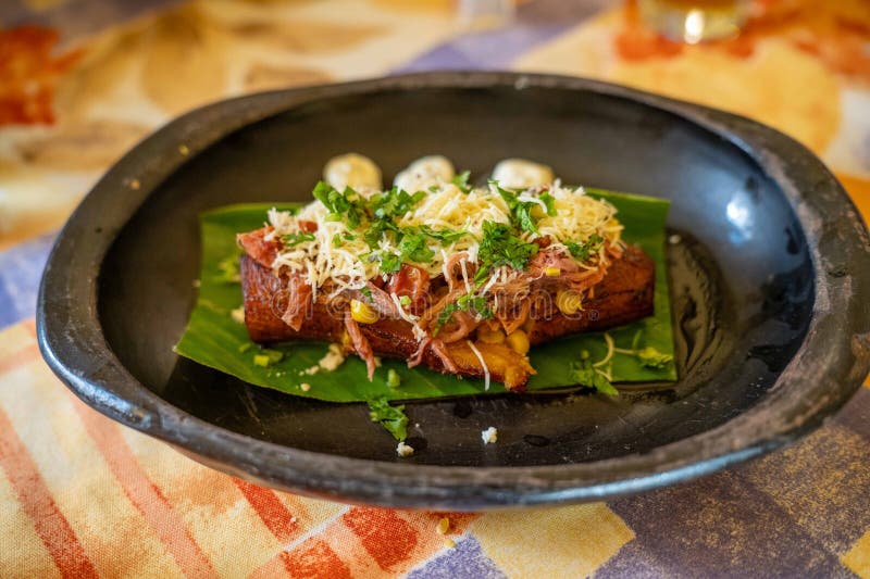 Delicious Fried Plantain Appetizer Covered in Beef Cheese Corn and ...