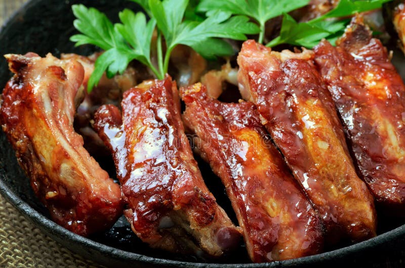 Delicious fried pork ribs stock image. Image of frying - 88429343