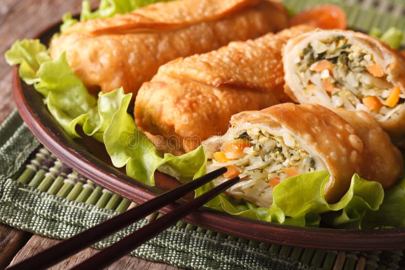 Delicious Fried Spring Rolls Sliced on a Plate Macro Stock Image ...