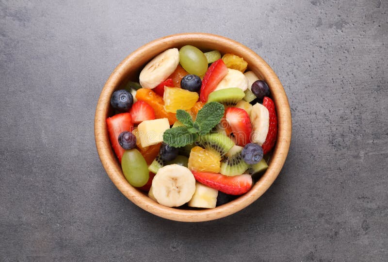 Delicious Fruit Salad on Grey Table, Top View Stock Image - Image of ...