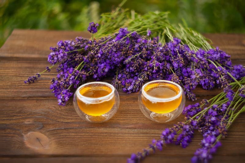 Delicious Green Tea in Beautiful Glass Teapot on Table Stock Photo ...