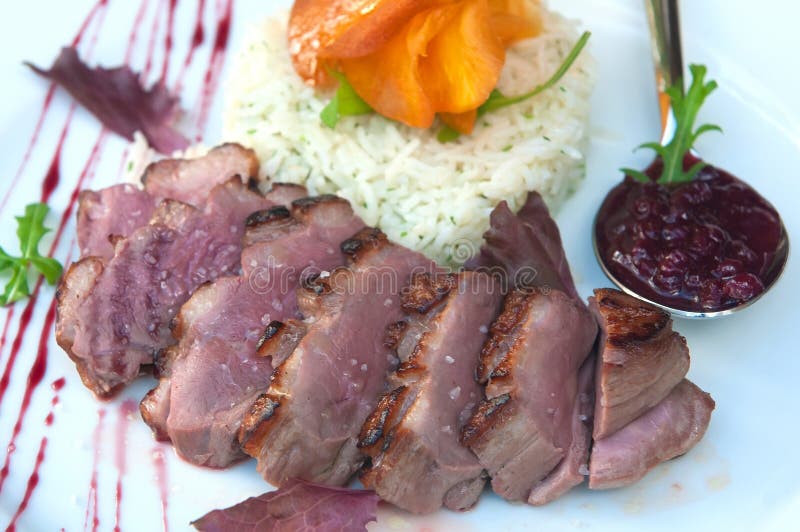 Delicious Grilled Duck Fillets with Its Garnish Stock Photo - Image of ...