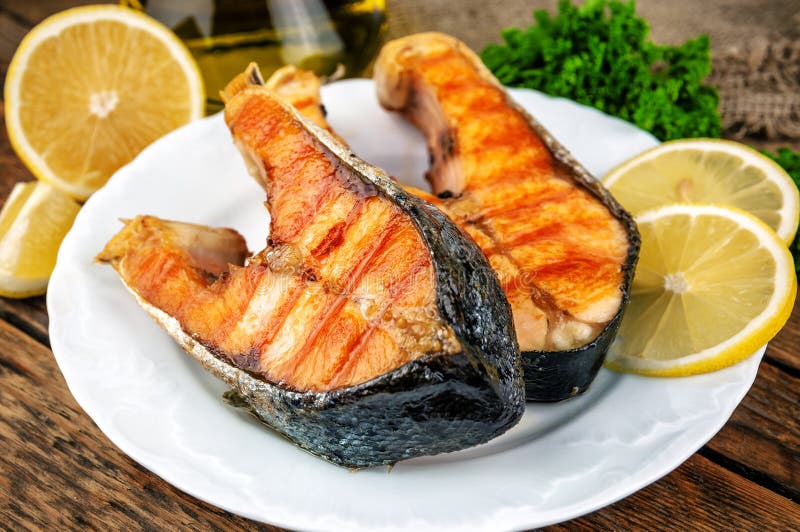 Delicious Grilled Fish with Lemon Stock Image - Image of baked, celery ...