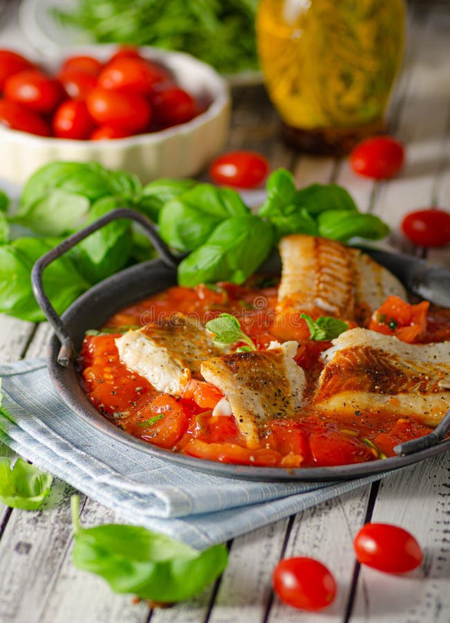 Delicious Grilled Fish with Tomato Sauce Stock Image - Image of basil ...