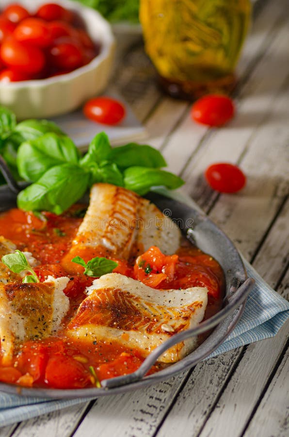 Delicious Grilled Fish with Tomato Sauce Stock Image - Image of basil ...
