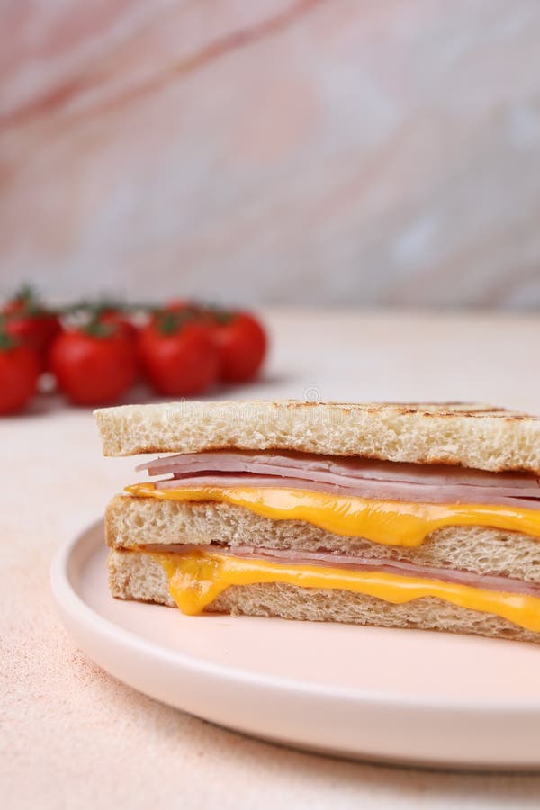 Delicious Grilled Sandwich with Ham and Cheese on Light Table Stock ...