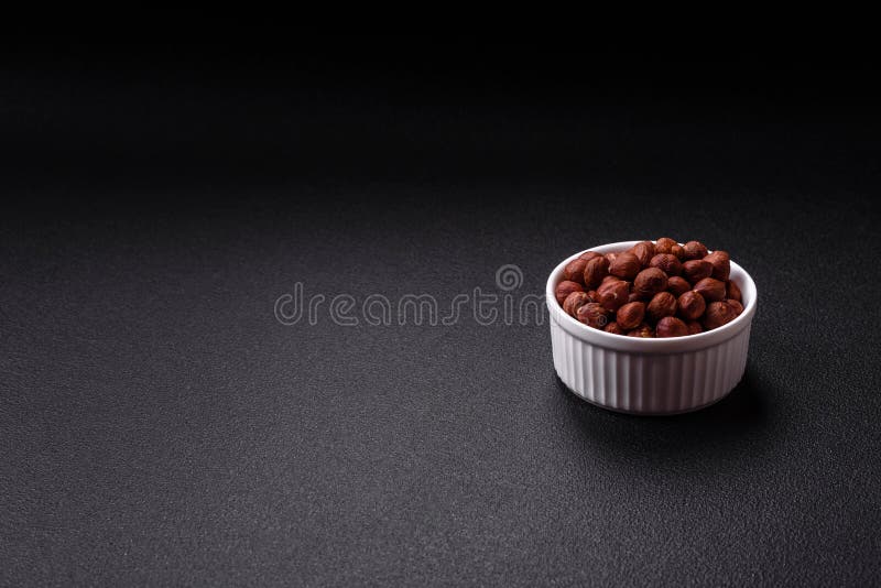 Delicious Hazelnut Whole, Raw, without Shell, on a Dark Concrete ...