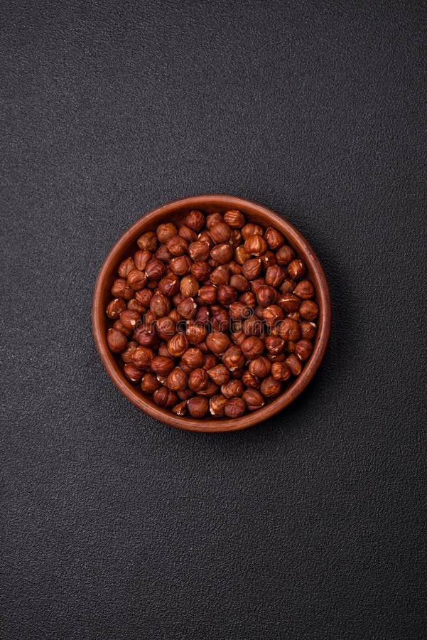 Delicious Hazelnut Whole, Raw, without Shell, on a Dark Concrete ...