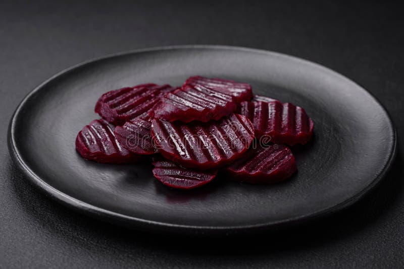 Delicious Healthy Boiled Ruby-colored Beets Sliced ??on a Black Plate ...