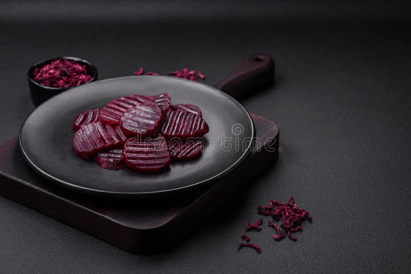 Delicious Healthy Boiled Ruby-colored Beets Sliced ??on a Black Plate ...