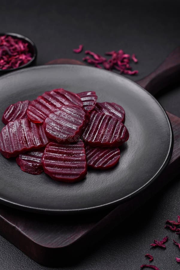 Delicious Healthy Boiled Ruby-colored Beets Sliced ??on a Black Plate ...